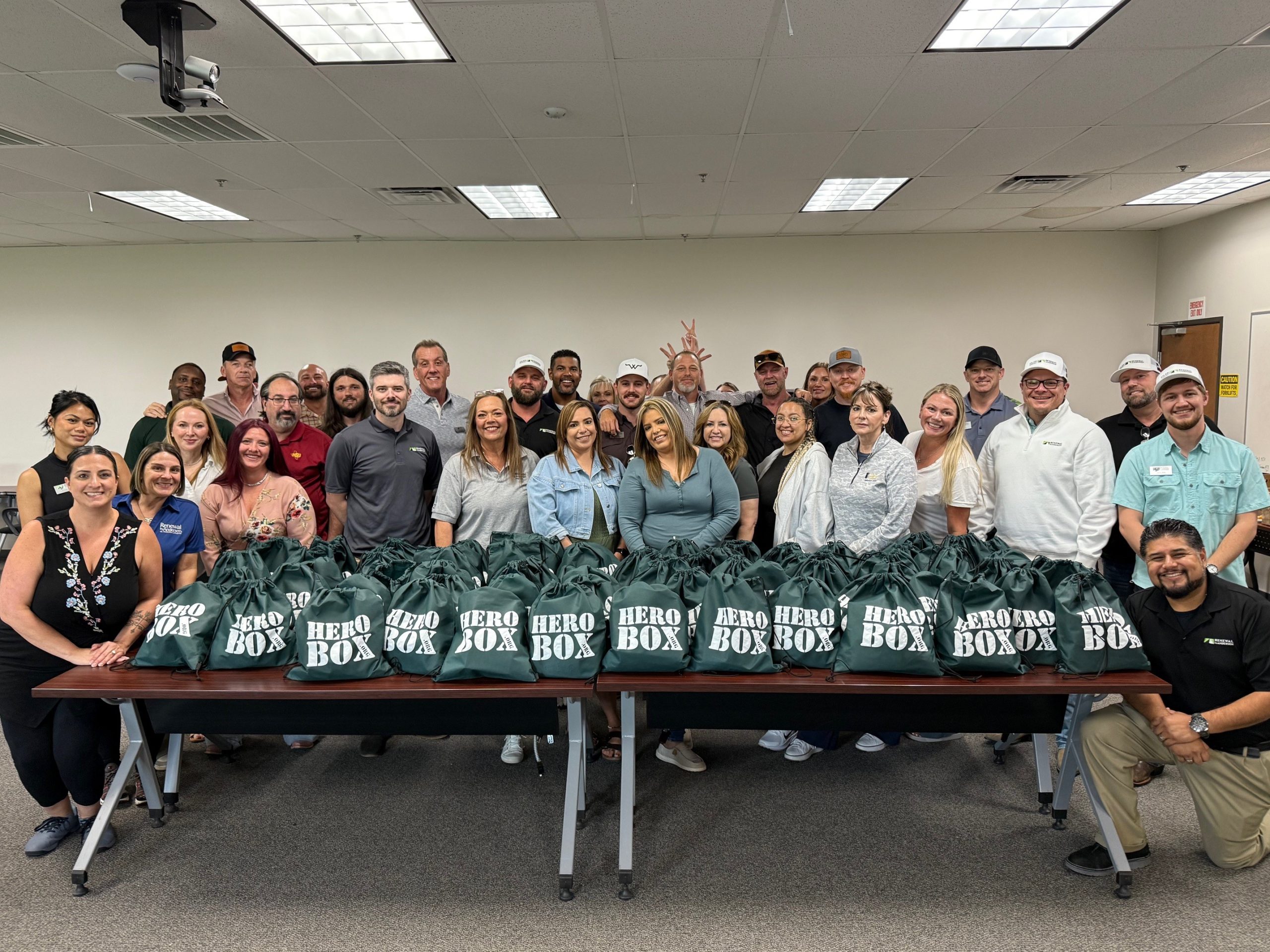 Esler Teammates Rally for Hero Day, Packing Hundreds of Care Packages ...